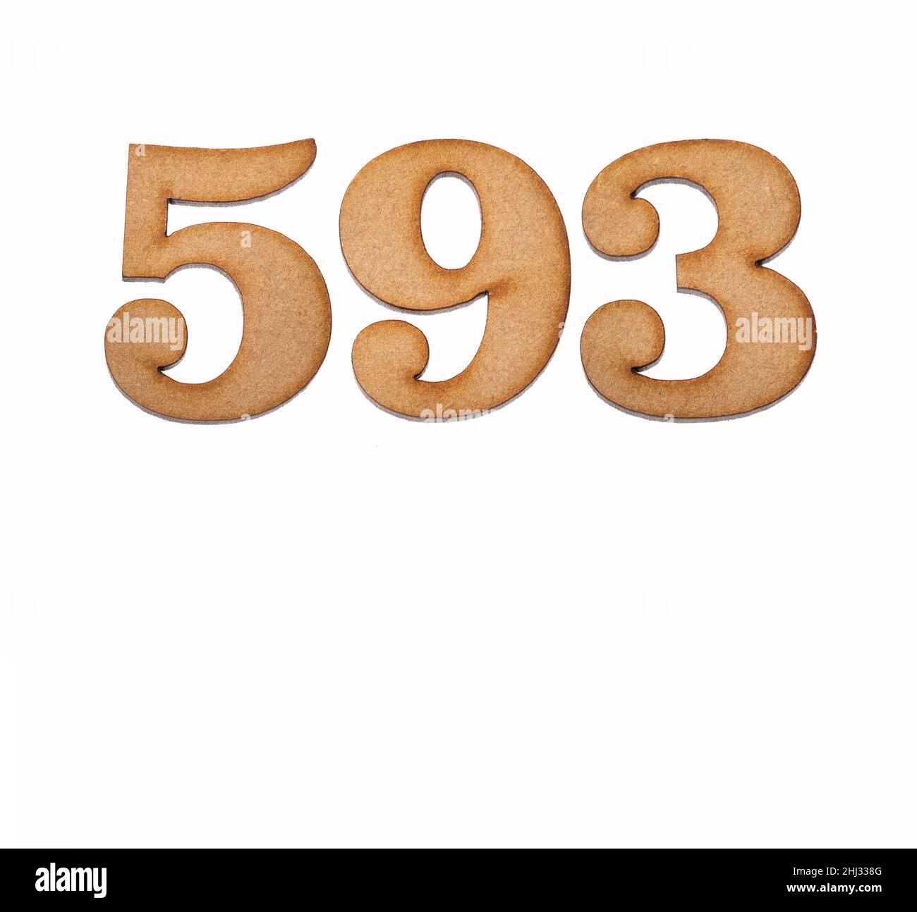 Number 593 in wood, isolated on white background Stock Photo - Alamy