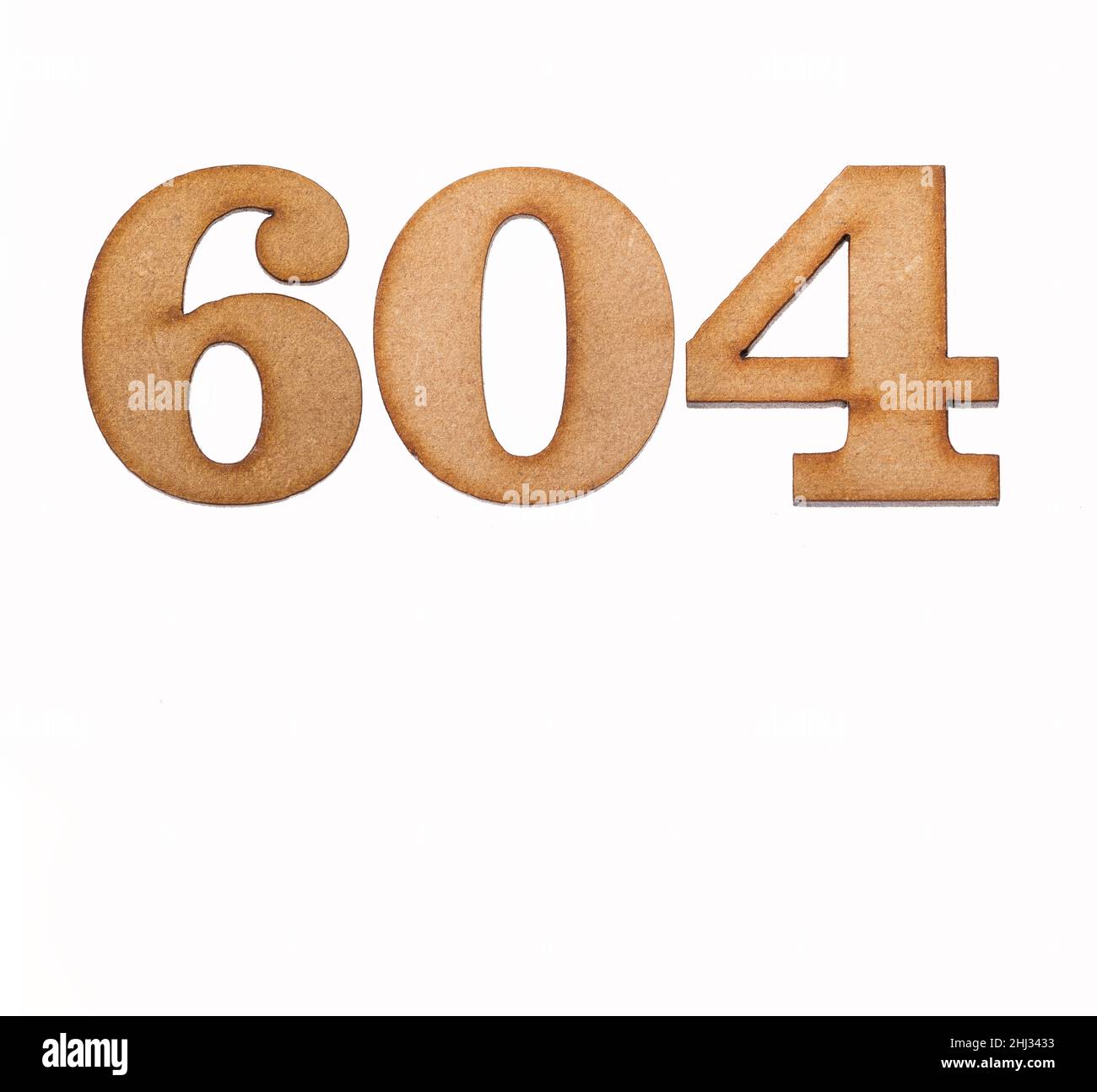 Number 604 - Piece of wood isolated on white background Stock Photo - Alamy
