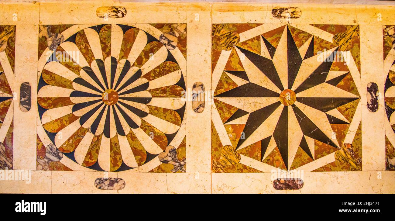 The altar and floor impress with beautiful marble inlay work showing ...