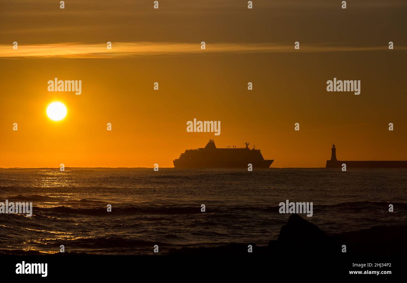 Sunrise on Tynemouth's Longsands beach as a passenger ferry heads ...
