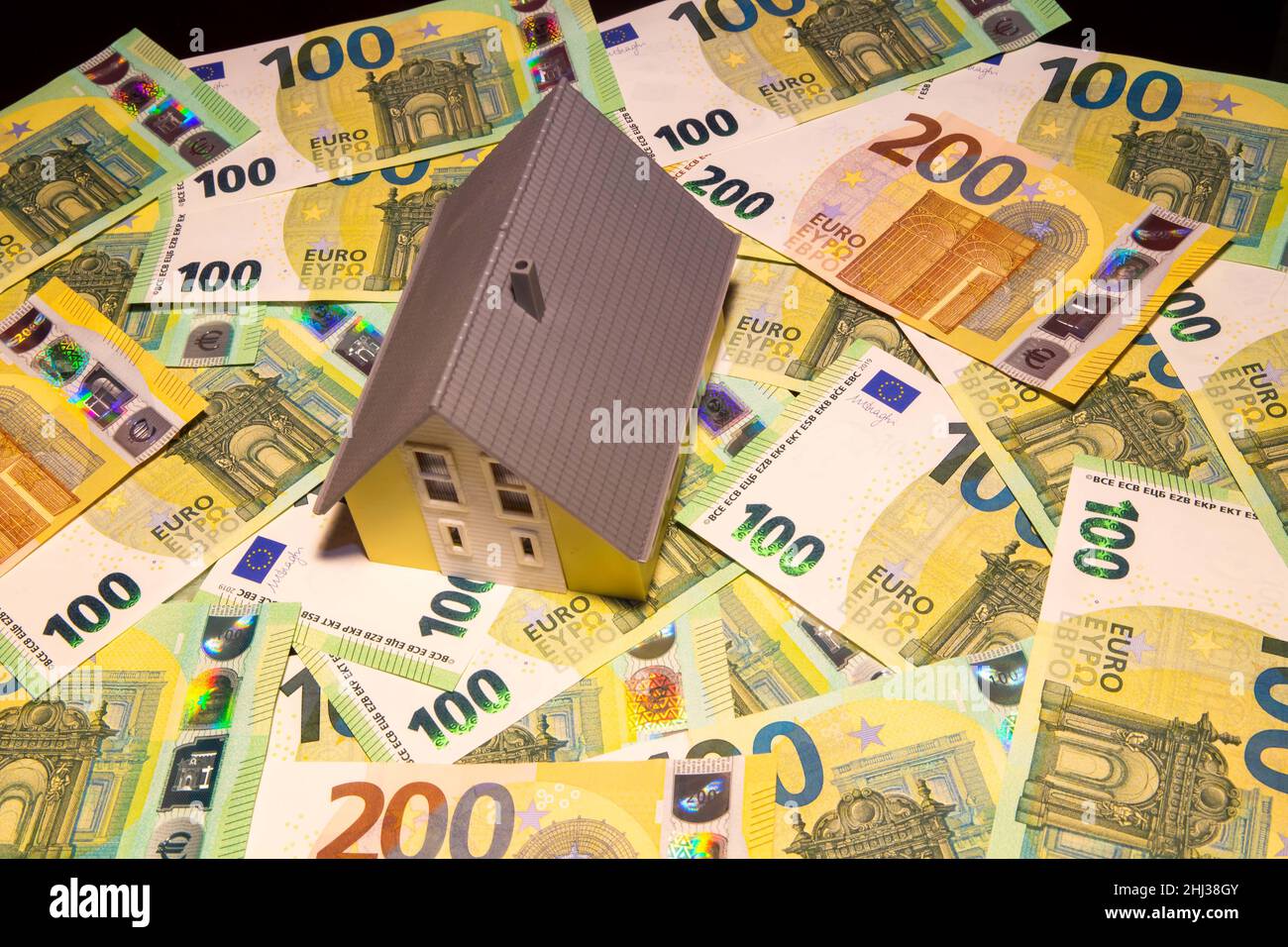 Symbol image construction costs or real estate prices: Model house on ...