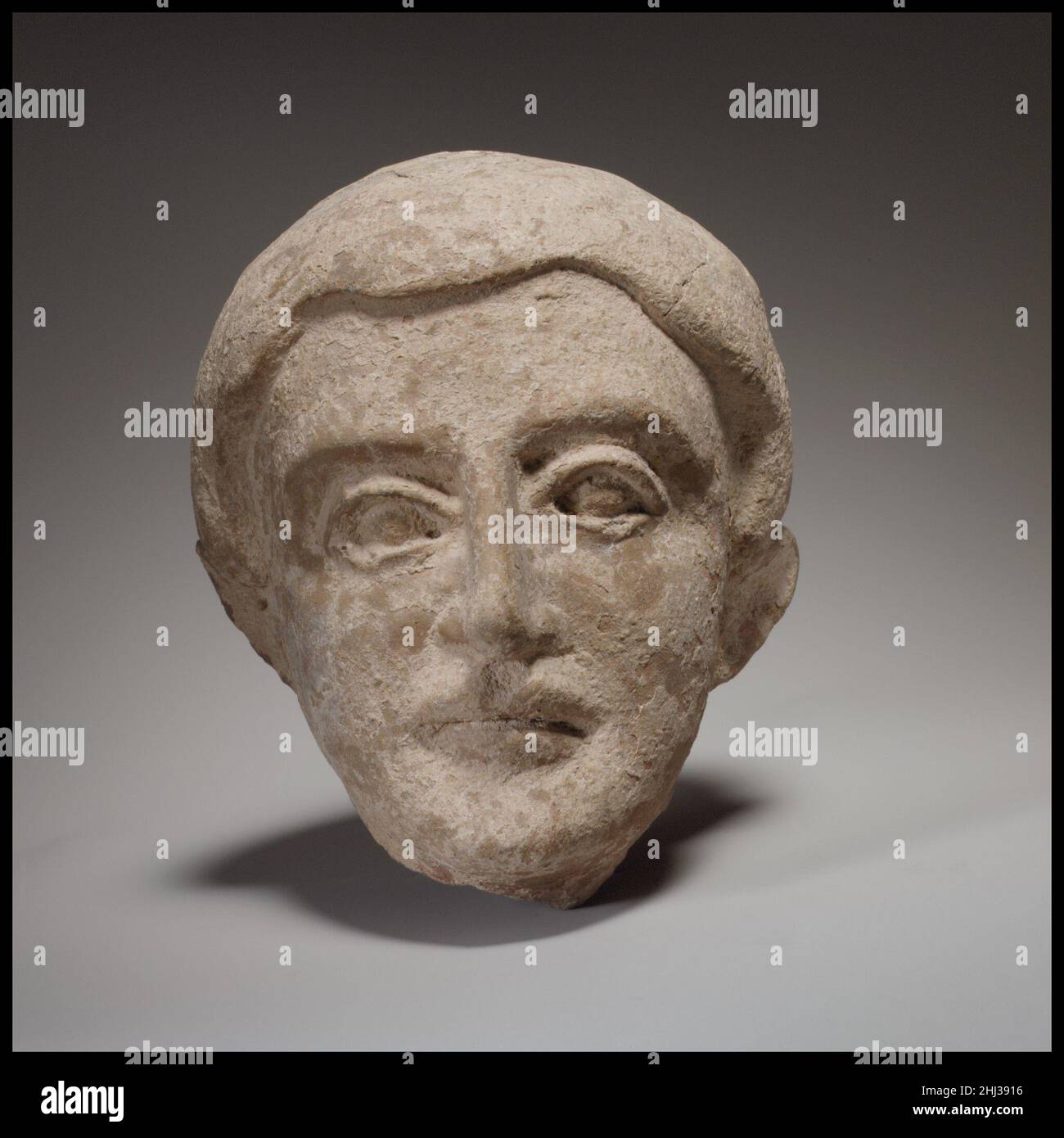 Terracotta head of a boy early 3rd century B.C. Cypriot The head is ...