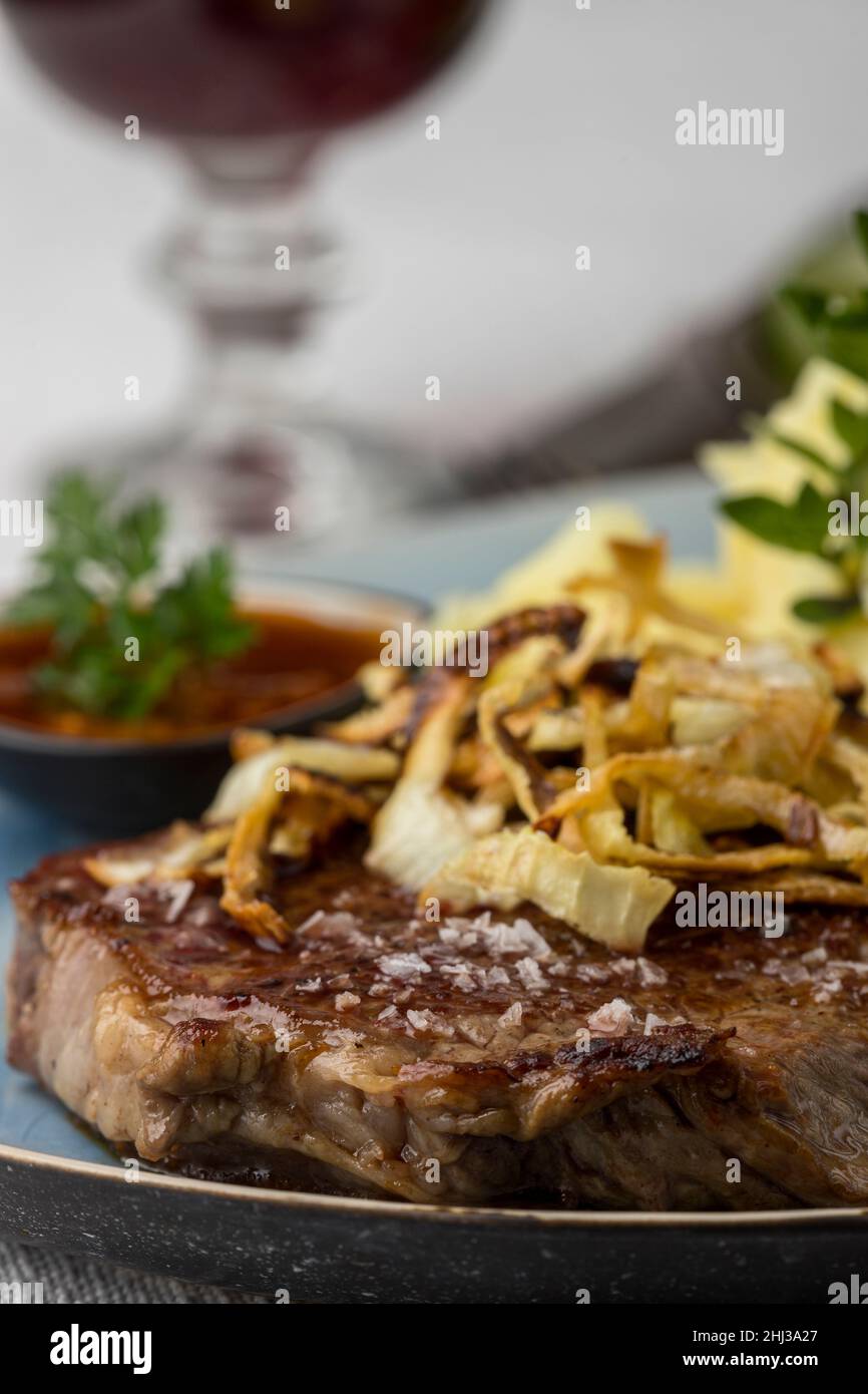 german steak with roasted onions Stock Photo - Alamy