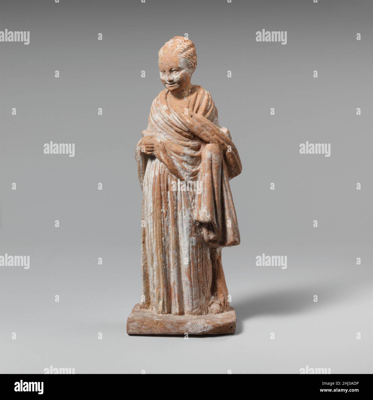 Terracotta statuette of a standing girl ca. 300 B.C. Greek, Attic By ...