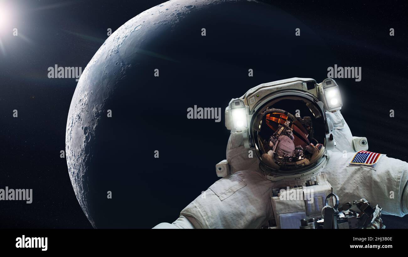 Cosmonaut in outer space on Moon planet background. Elements of this ...