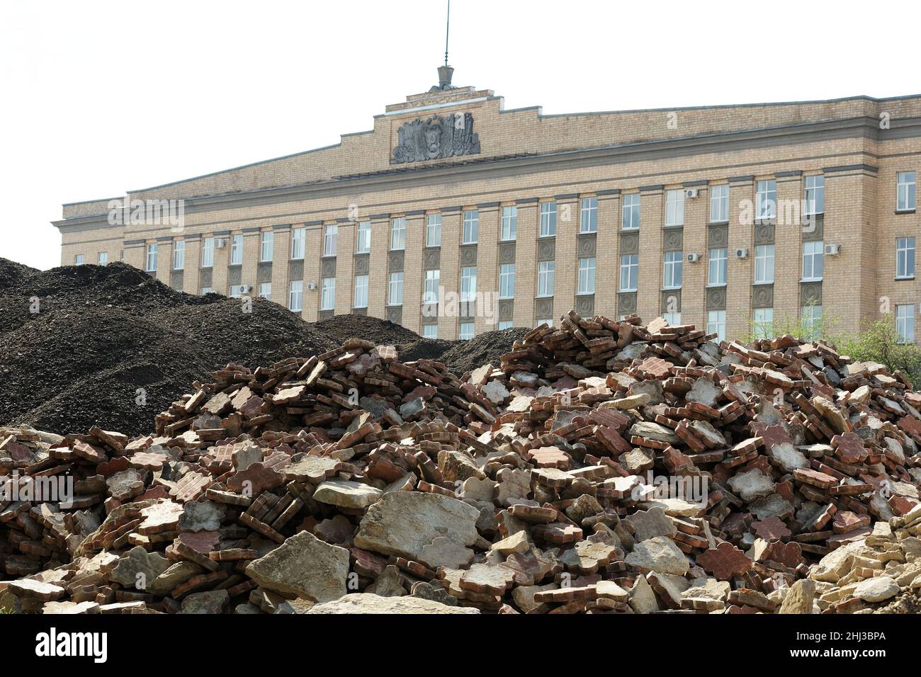 Russian Government building Soviet style with ruins on foreground ...