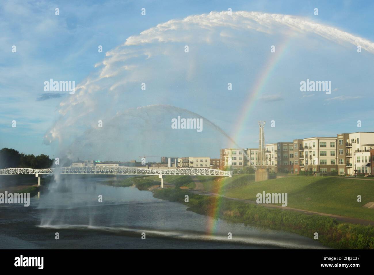 Rainbow in the river fountain spray. At the confluence of the Mad River ...