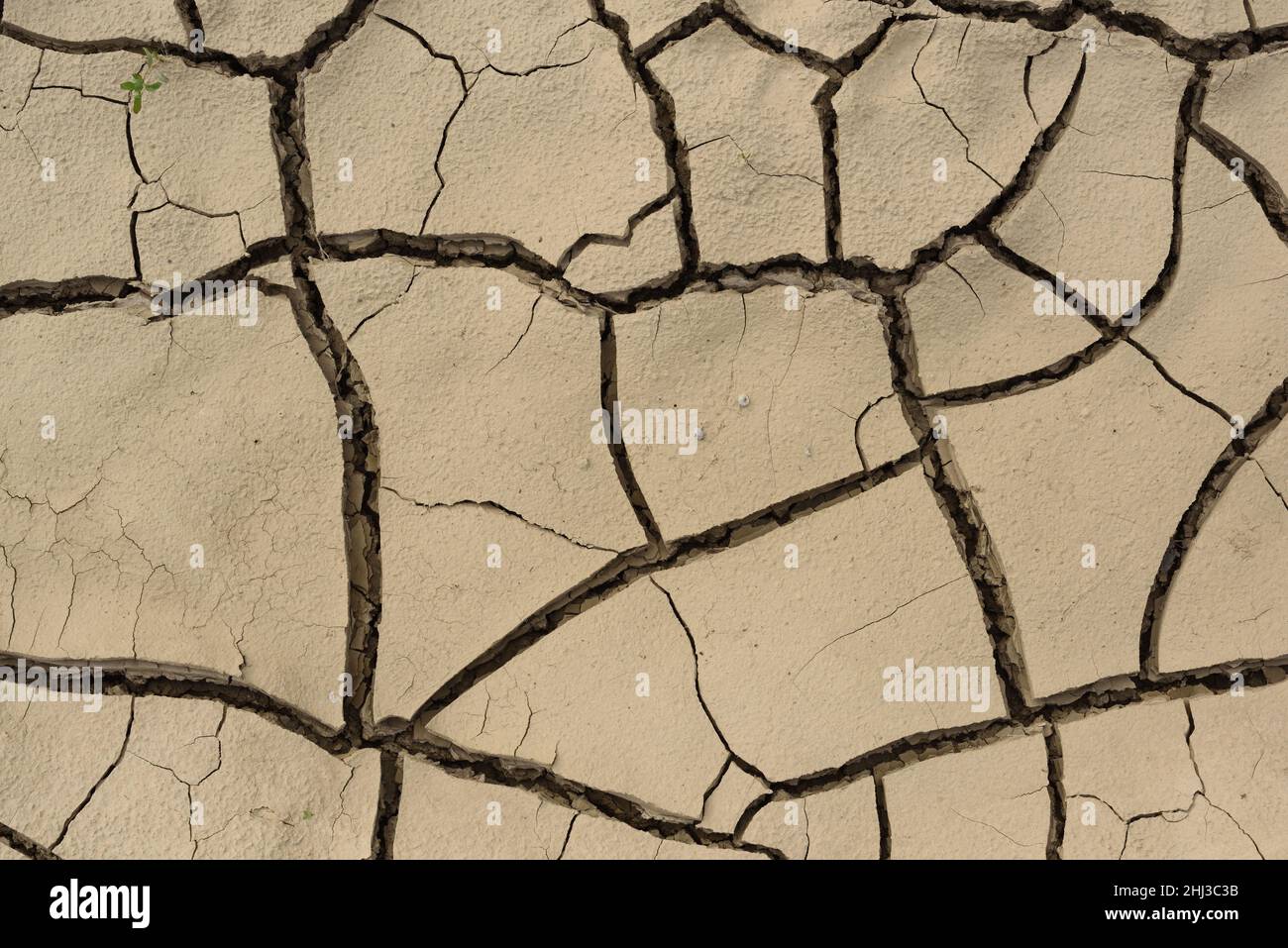 Cracked dry land. Concept of ecological catastrophe and global warming ...