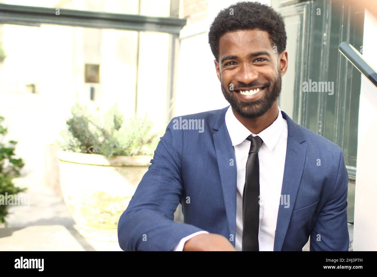 Portrait of a beautiful business man outside Stock Photo - Alamy