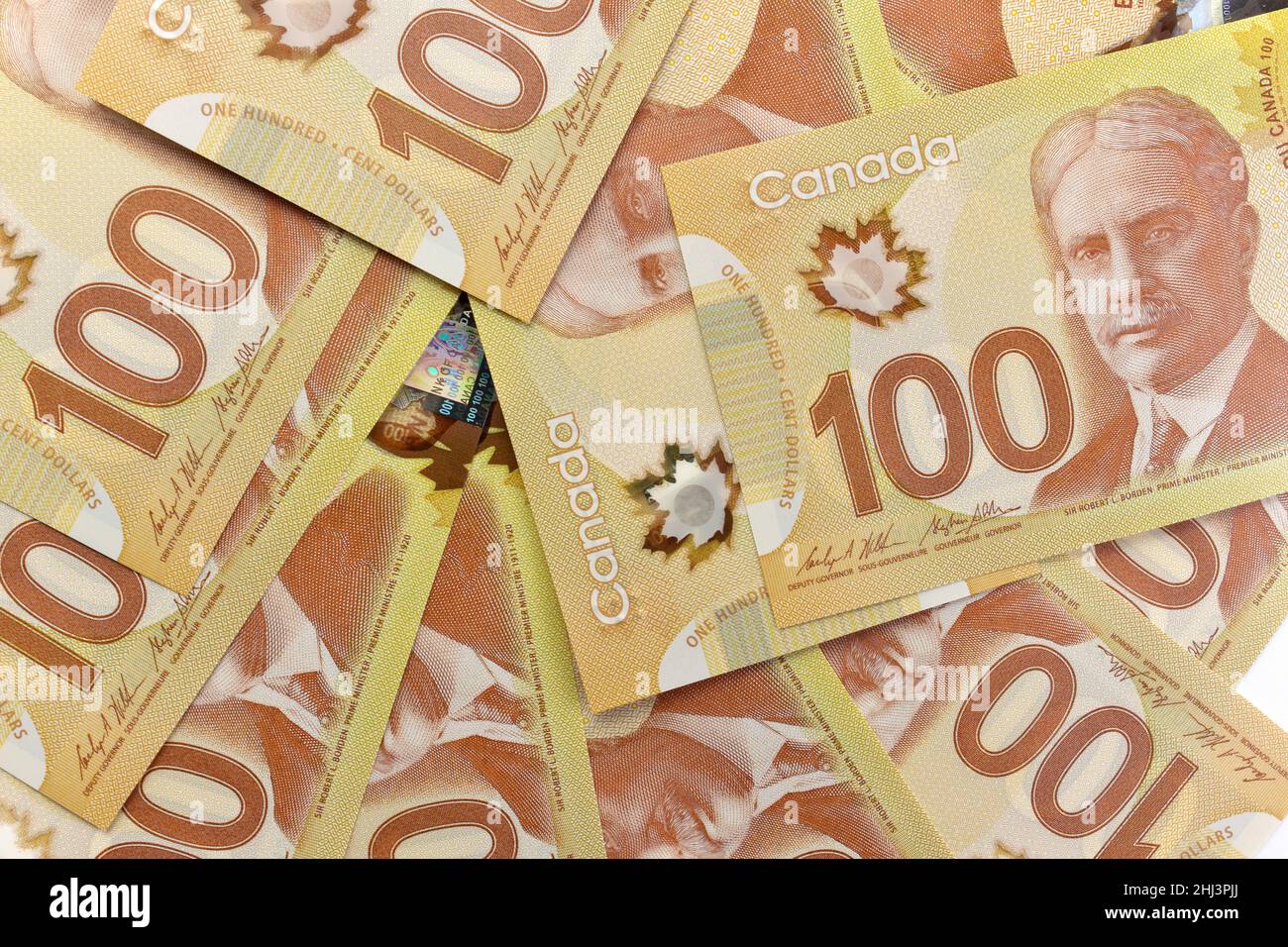 Stack canadian 100 dollar bills hi-res stock photography and images - Alamy