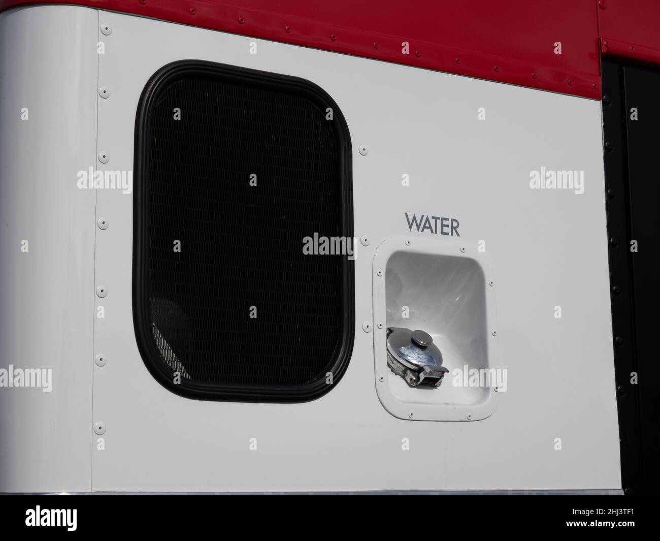 bus water filler cap detail Stock Photo - Alamy