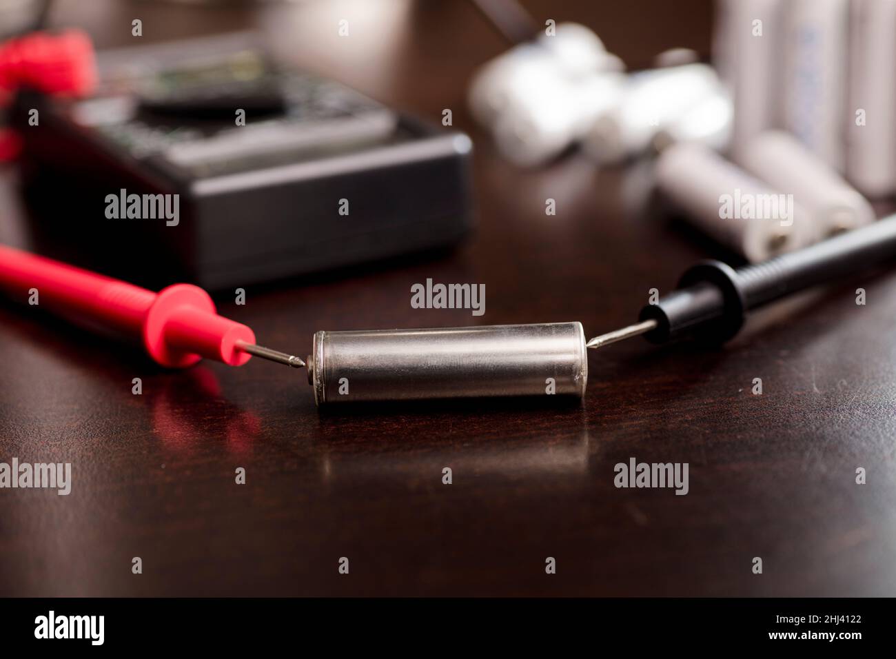 battery with volt calculator, voltmeter, red positive pole, black ...