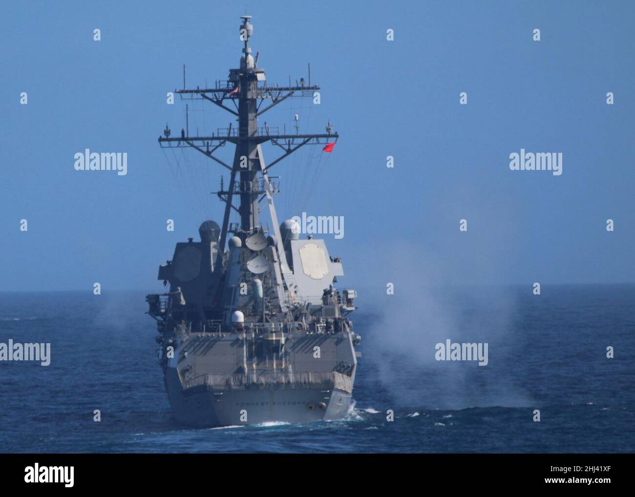 Stern view of USS Forrest Sherman (DDG-98) firing 5-inch gun 180221 ...