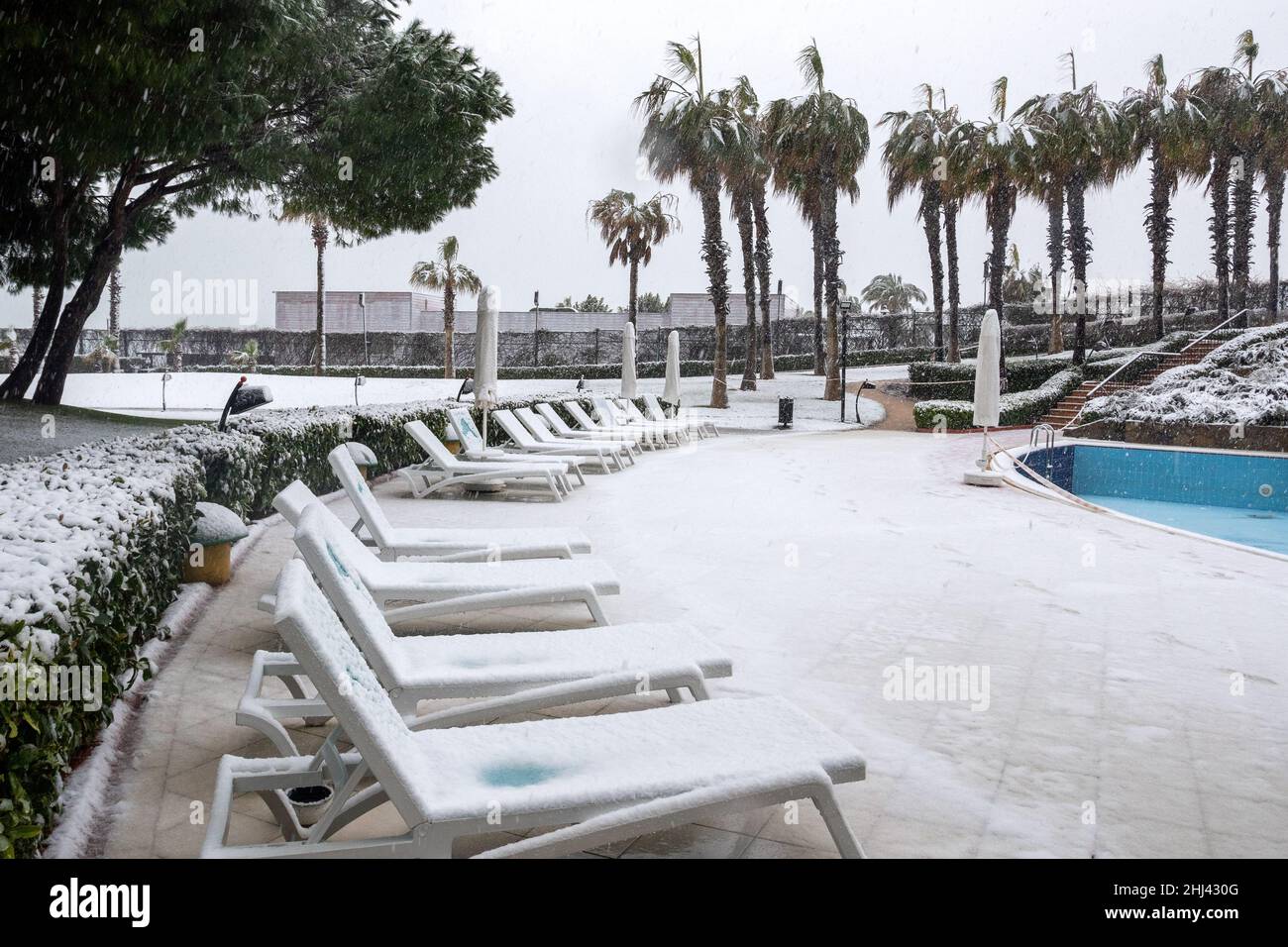 Heavy snowfall on the Mediterranean coast. Snow storm and white covered ...
