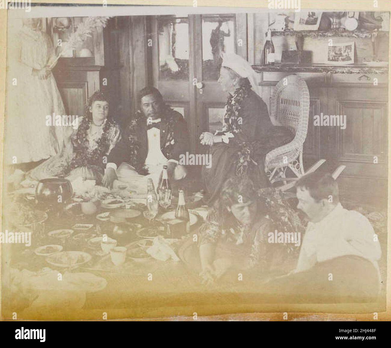 Stevenson Family with Kalakaua at a luau Stock Photo - Alamy