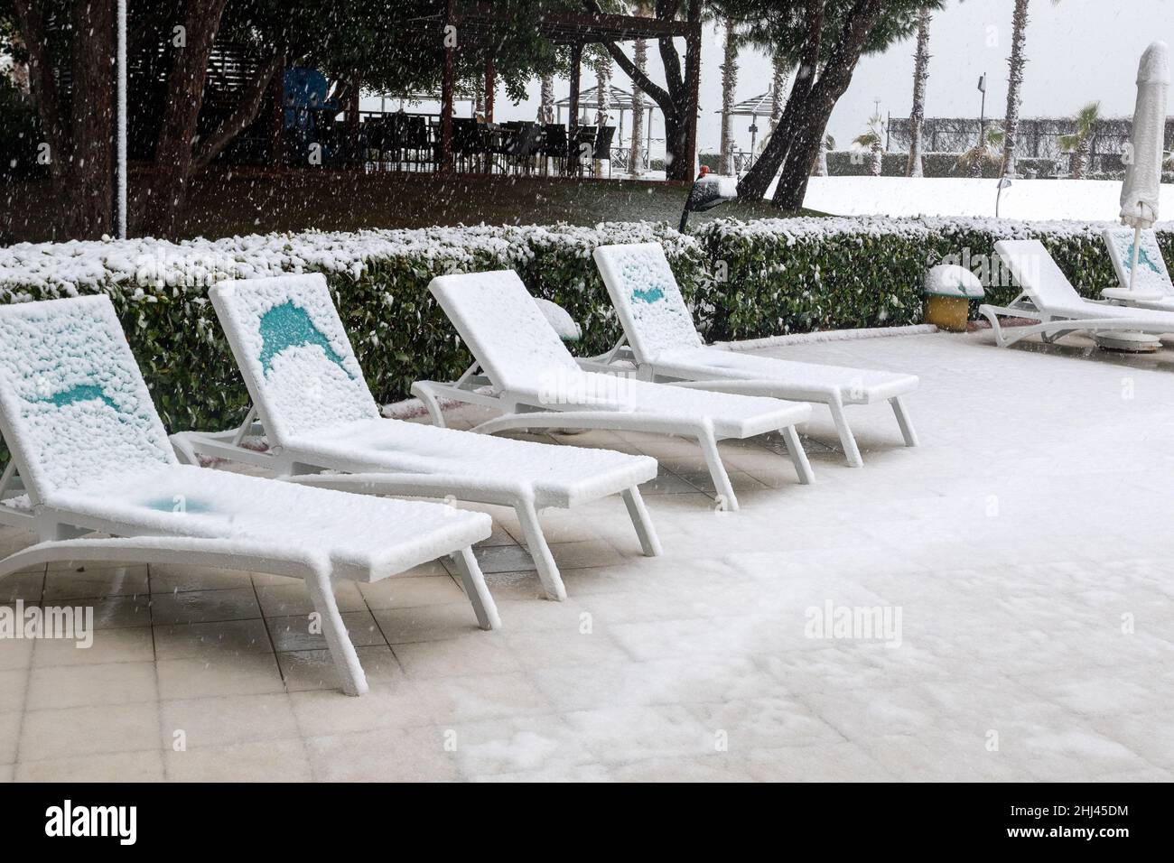 Heavy snowfall on the Mediterranean coast. Snow storm and white covered ...
