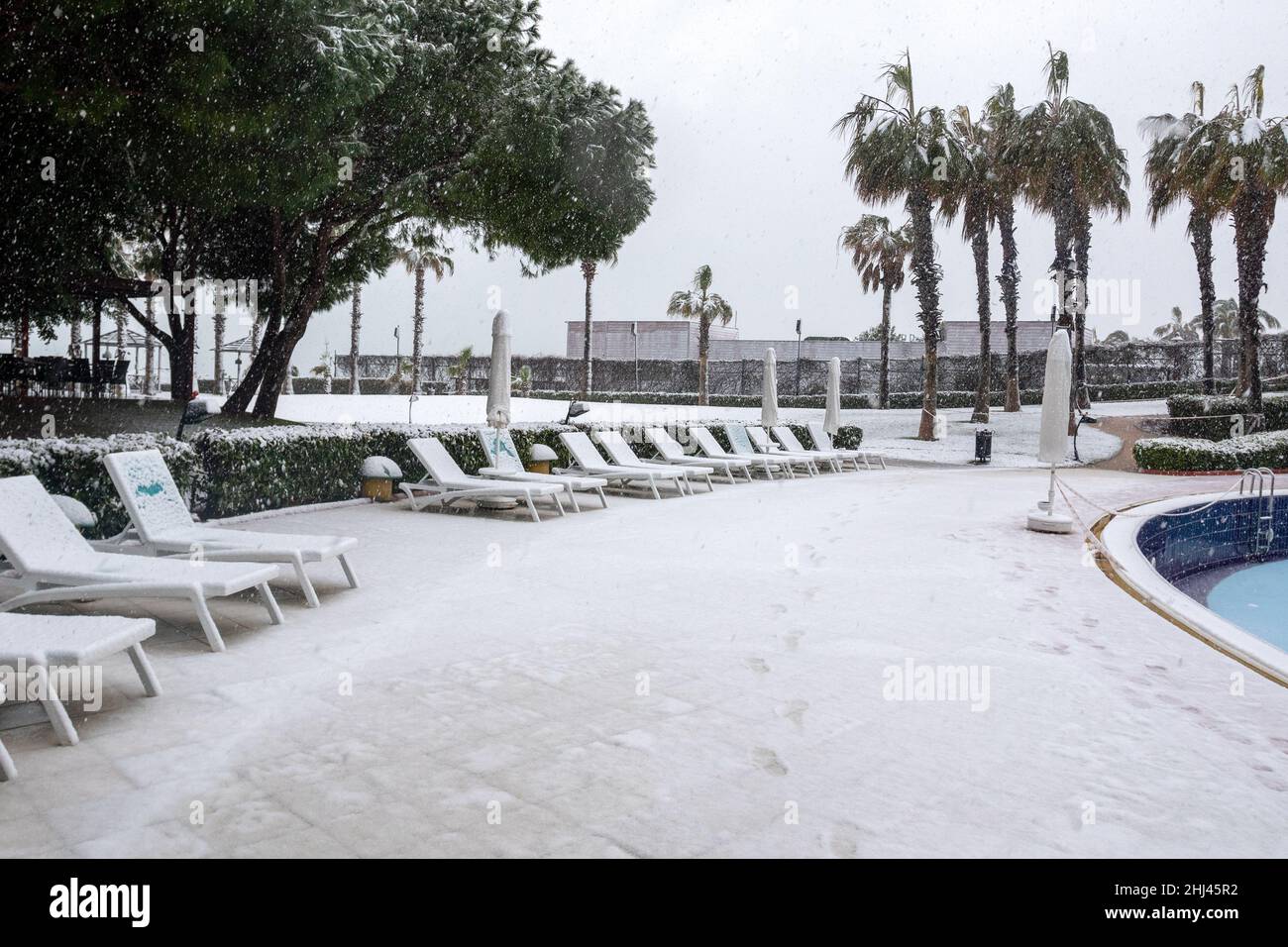 Heavy snowfall on the Mediterranean coast. Snow storm and white covered ...