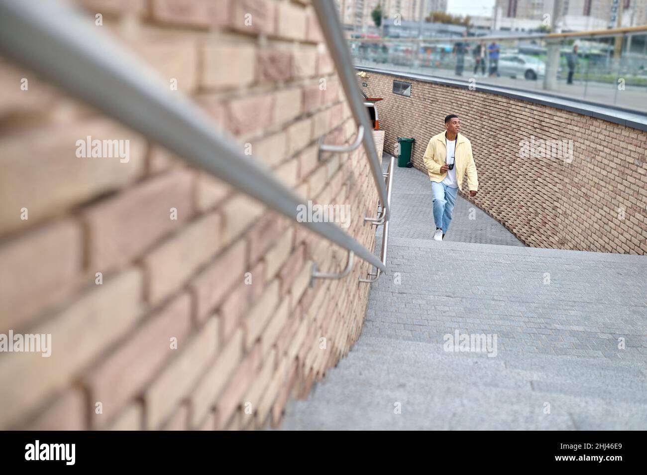 Side view of man climbing wall hi-res stock photography and images - Alamy