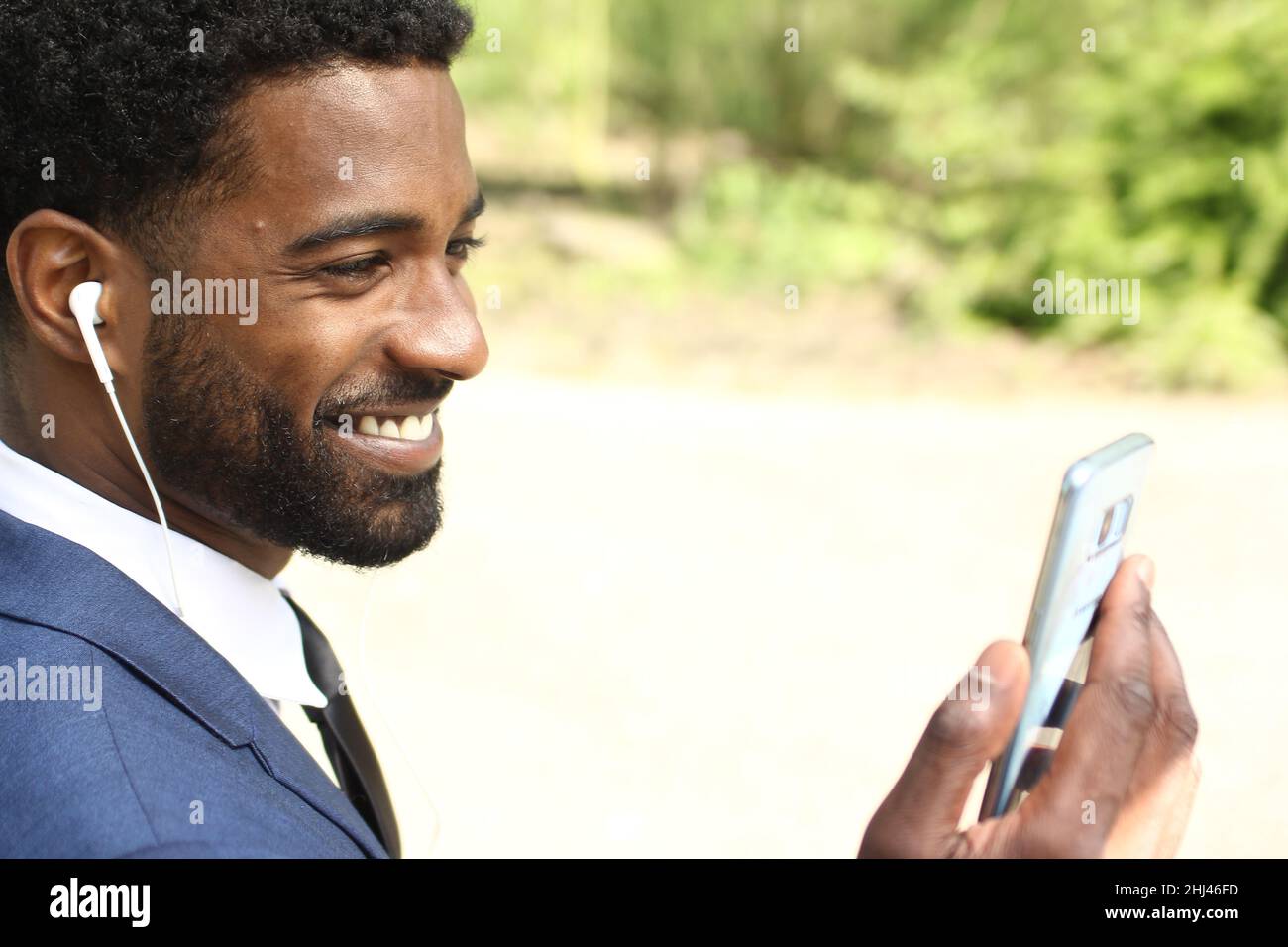 Portrait of a beautiful business man outside Stock Photo - Alamy