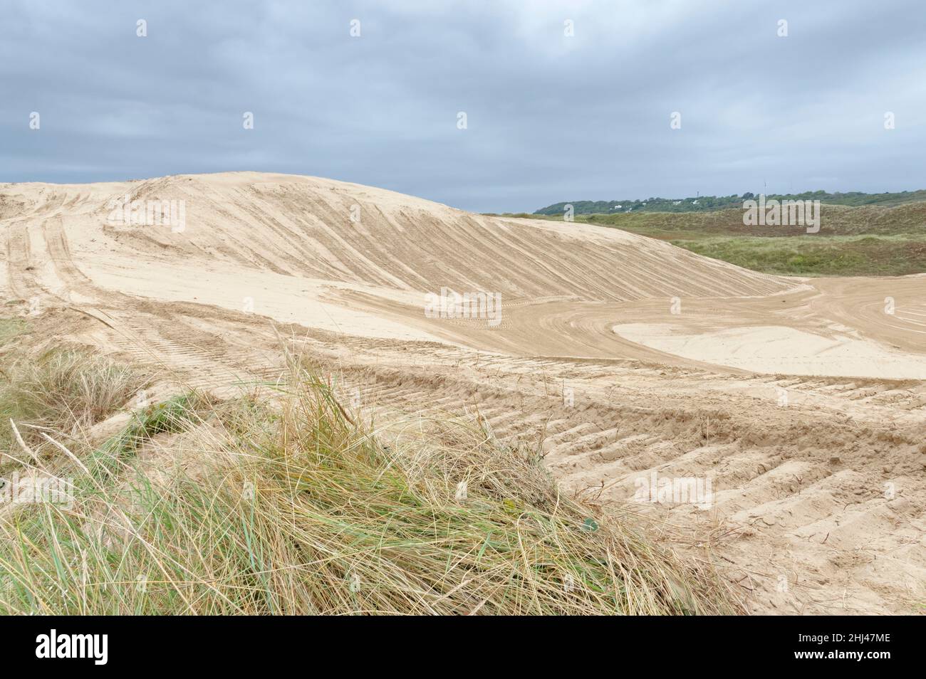 Coastal sand dunes recently scraped clear of vegetation by the Sands of ...