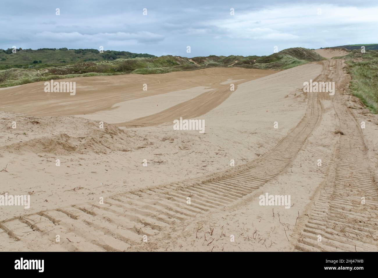 Coastal sand dunes recently scraped clear of vegetation by the Sands of ...