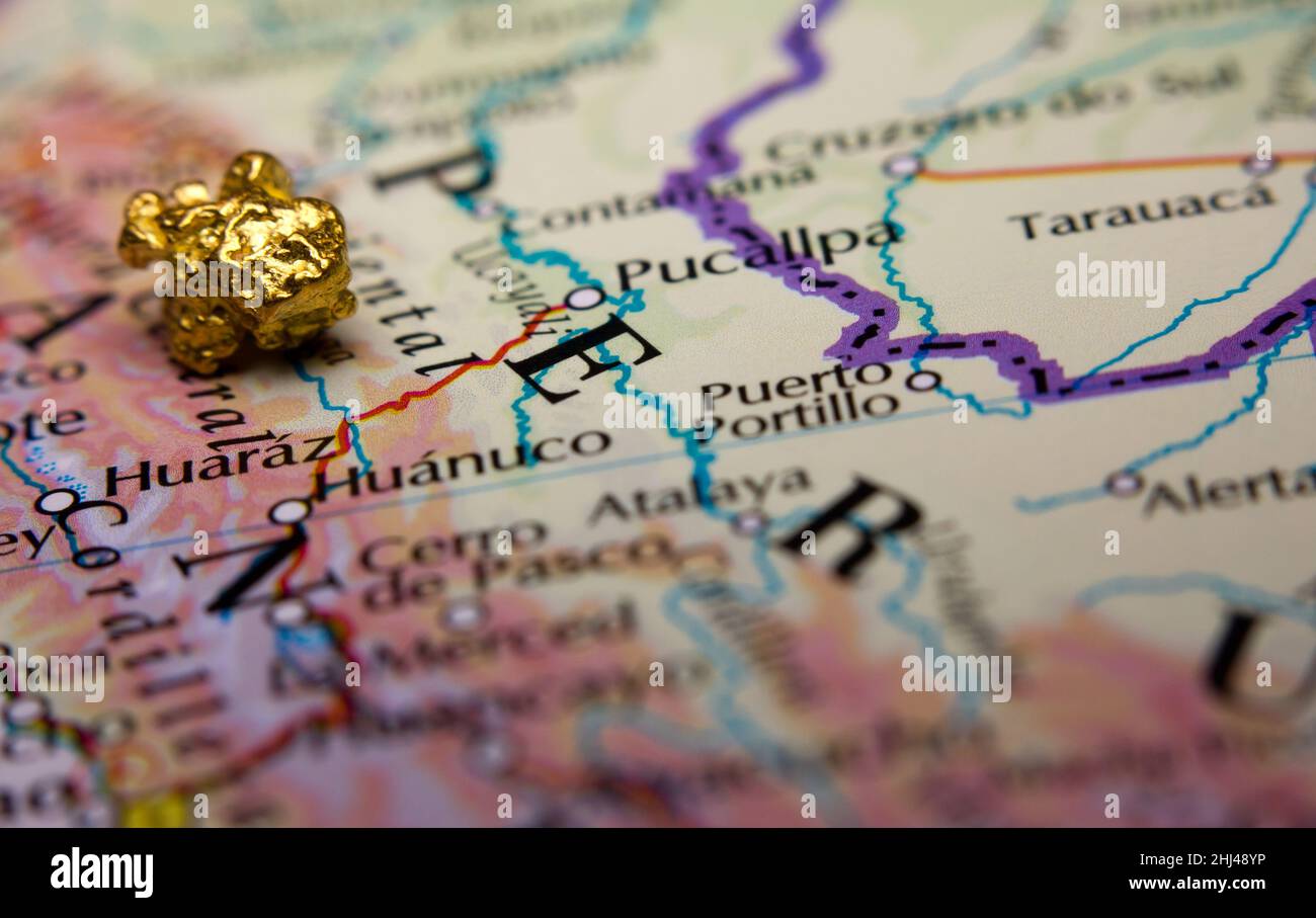 Close-up of a gold-nugget on top of a map of Peru Stock Photo - Alamy