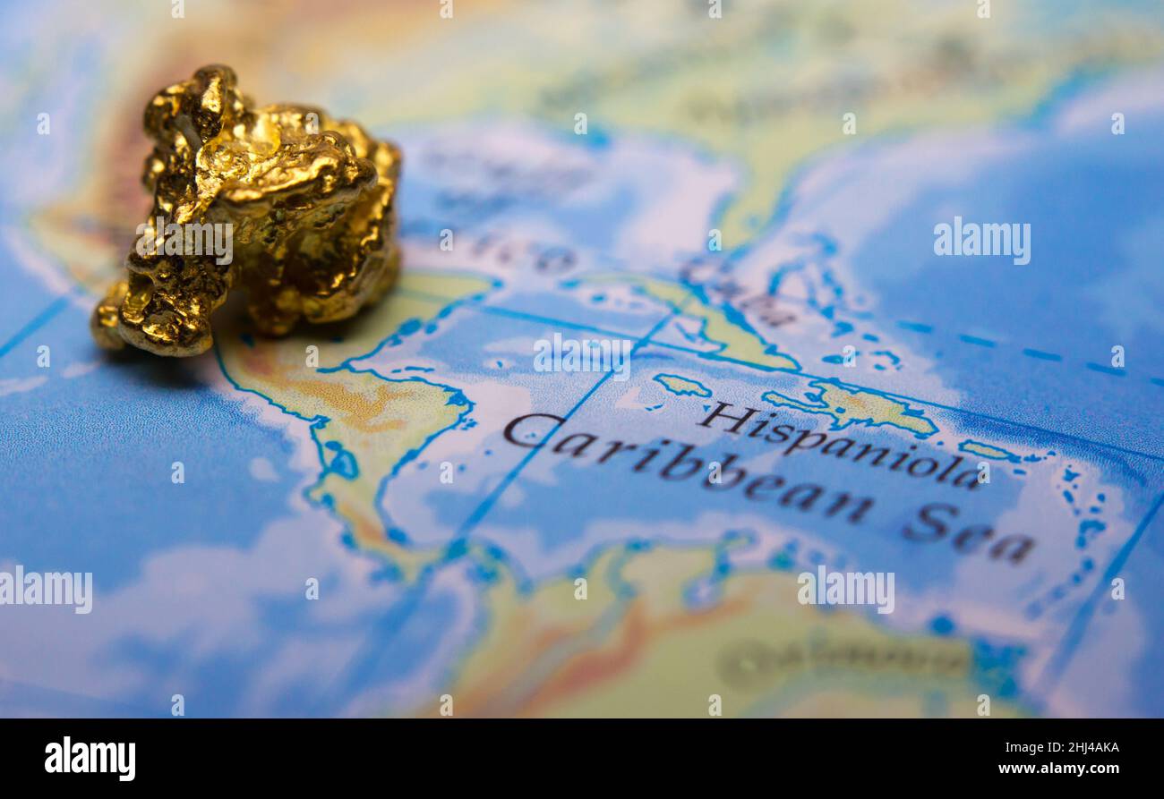 Close-up of a gold-nugget on top of a map of Mexico Stock Photo - Alamy