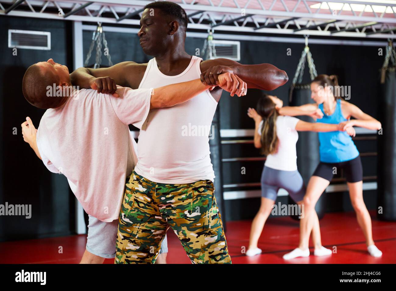 Two man training captures on self-defense course Stock Photo - Alamy