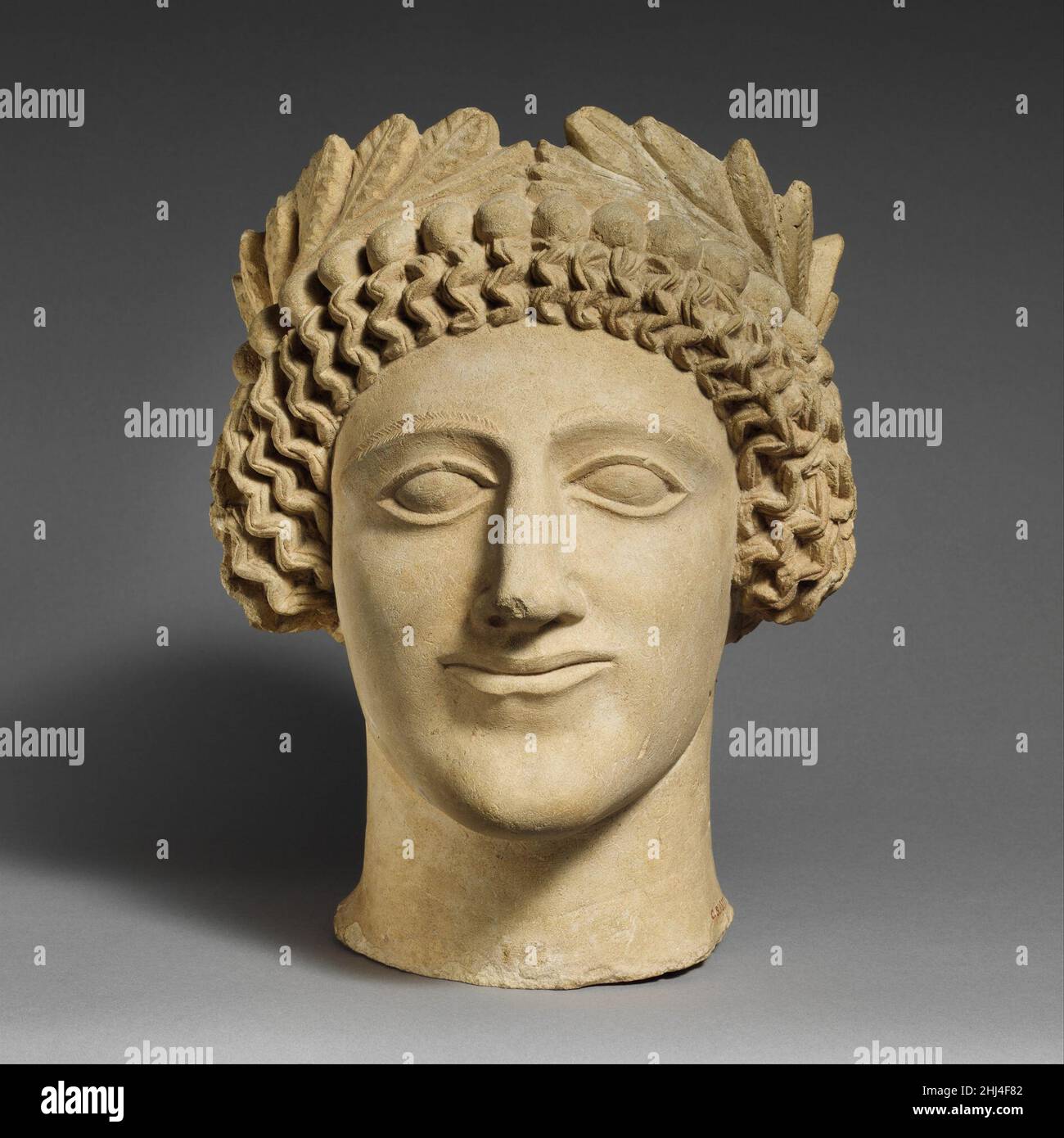 Limestone head of a youth with wreath mid–5th century B.C. Cypriot ...