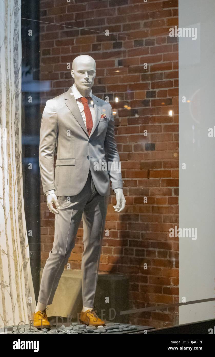 Stylish men's suit on a mannequin in the shop window. Suit in a ...