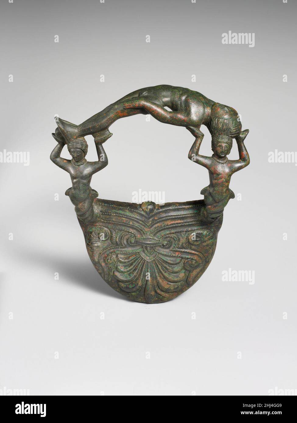 Bronze handle with nereids supporting a youth 4th century B.C. Etruscan ...