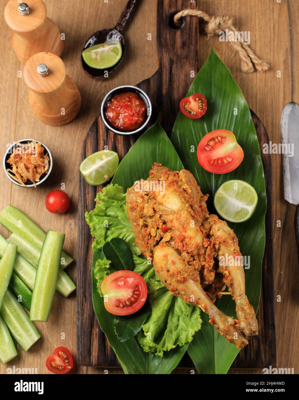 Ayam Betutu. Balinese Roast Chicken Stuffed with Cassava Leaves Stock ...