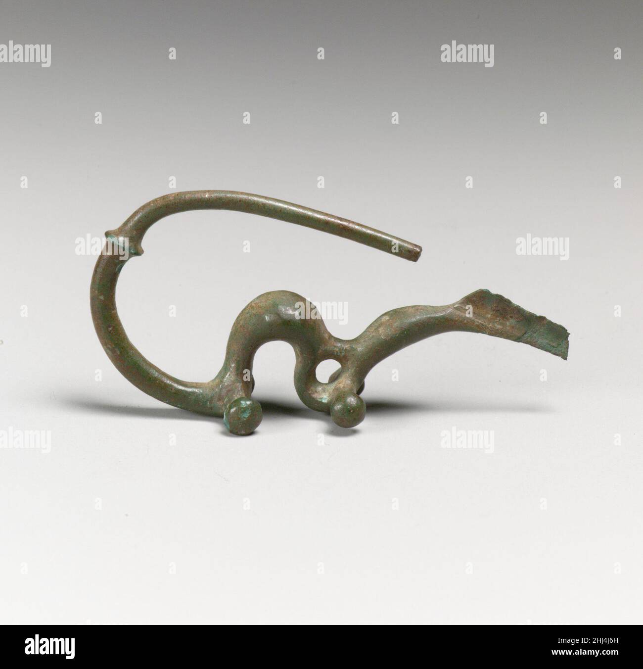 Fibula, serpentine type 7th–6th century B.C. Italic The bow has two ...