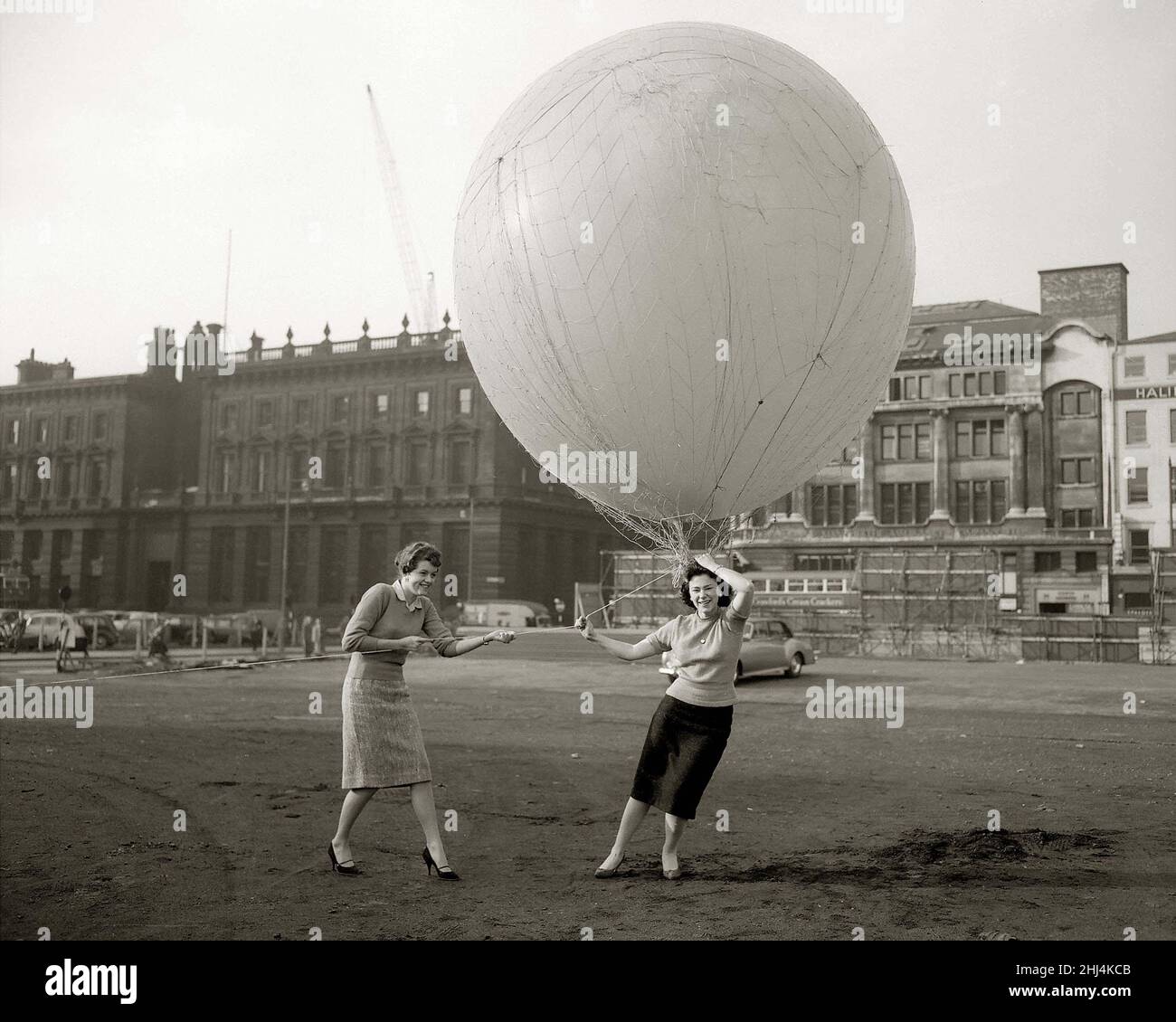 A Large helium filled balloon is raised over the site of the new ...