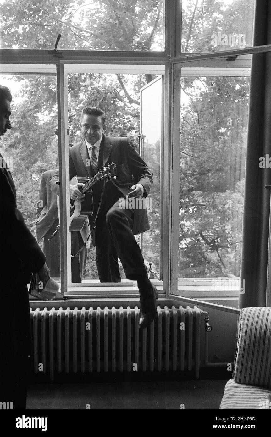 American country singer and musician Johnny Cash poses for ...