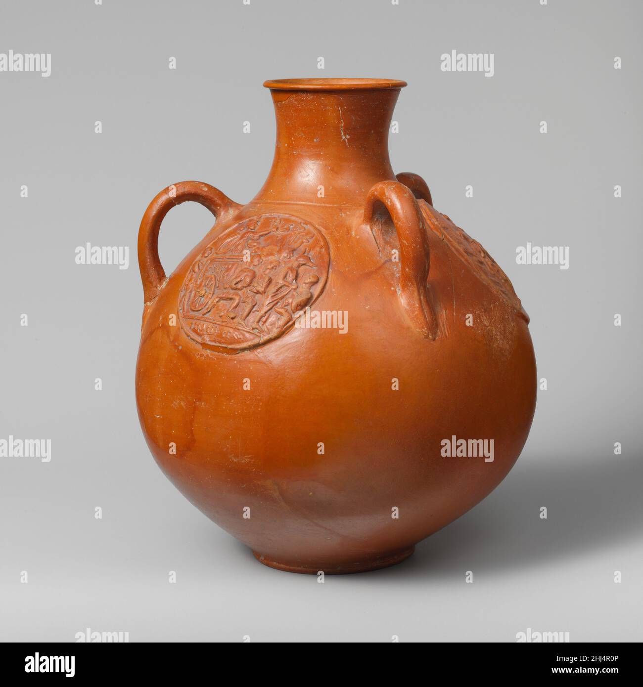 Three-handled jug with relief medallions late 2nd–early 3rd century A.D ...