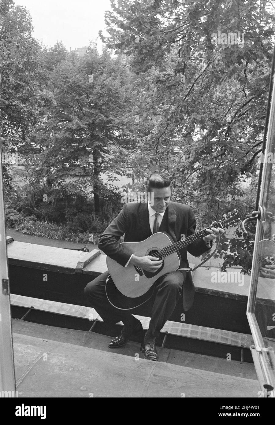 American country singer and musician Johnny Cash poses for ...