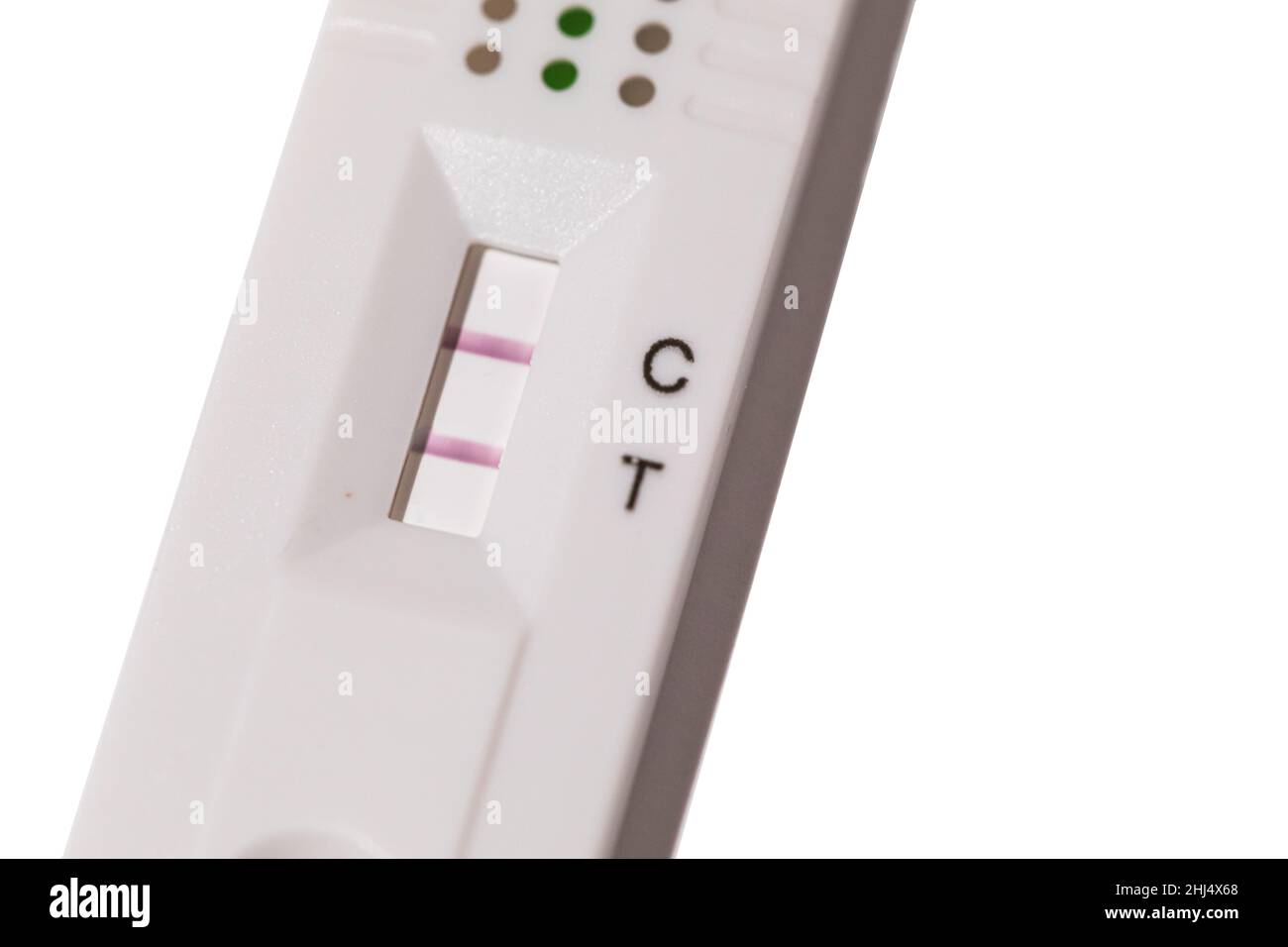 Detail of an antigen test with two red lines, giving a positive result ...