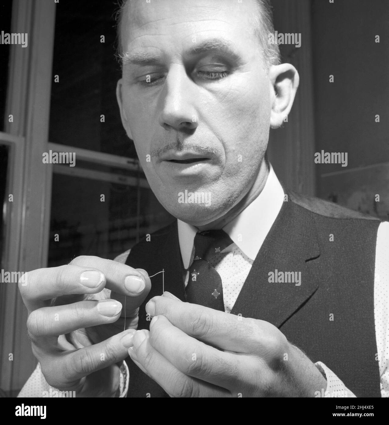 Tailor measuring Black and White Stock Photos & Images - Alamy