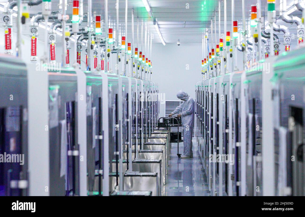 NANCHANG, CHINA - JANUARY 26, 2022 - A worker in a dust-proof suit ...