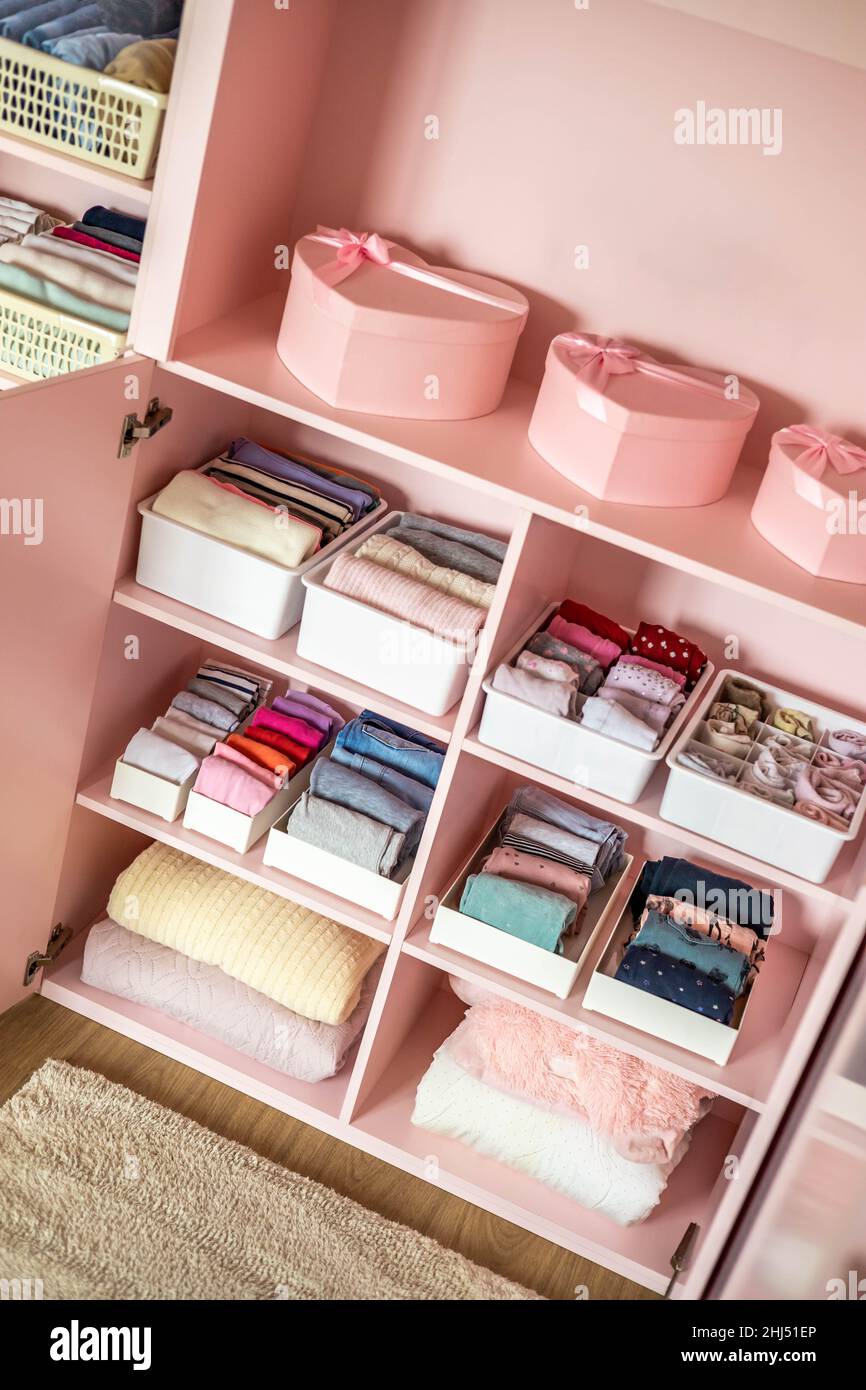 Female kid pink closet with comfortable vertical storage clothes ...