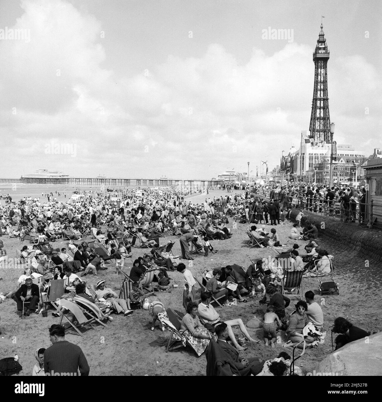 General view showing busy scenes at Blackpool beach in the summer ...
