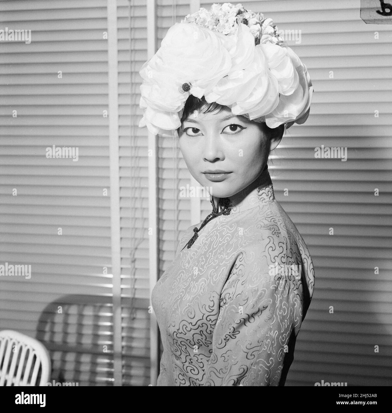 Tsai chin hat Black and White Stock Photos & Images - Alamy