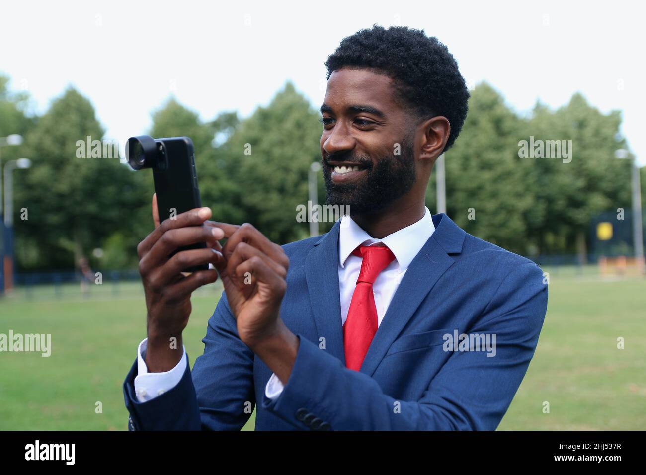 Portrait of a beautiful business man outside Stock Photo - Alamy