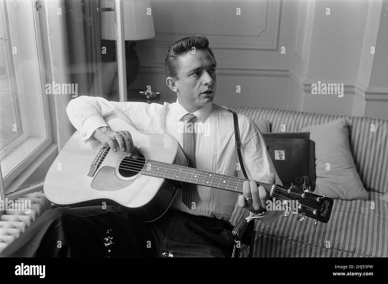 American country singer and musician Johnny Cash poses for ...