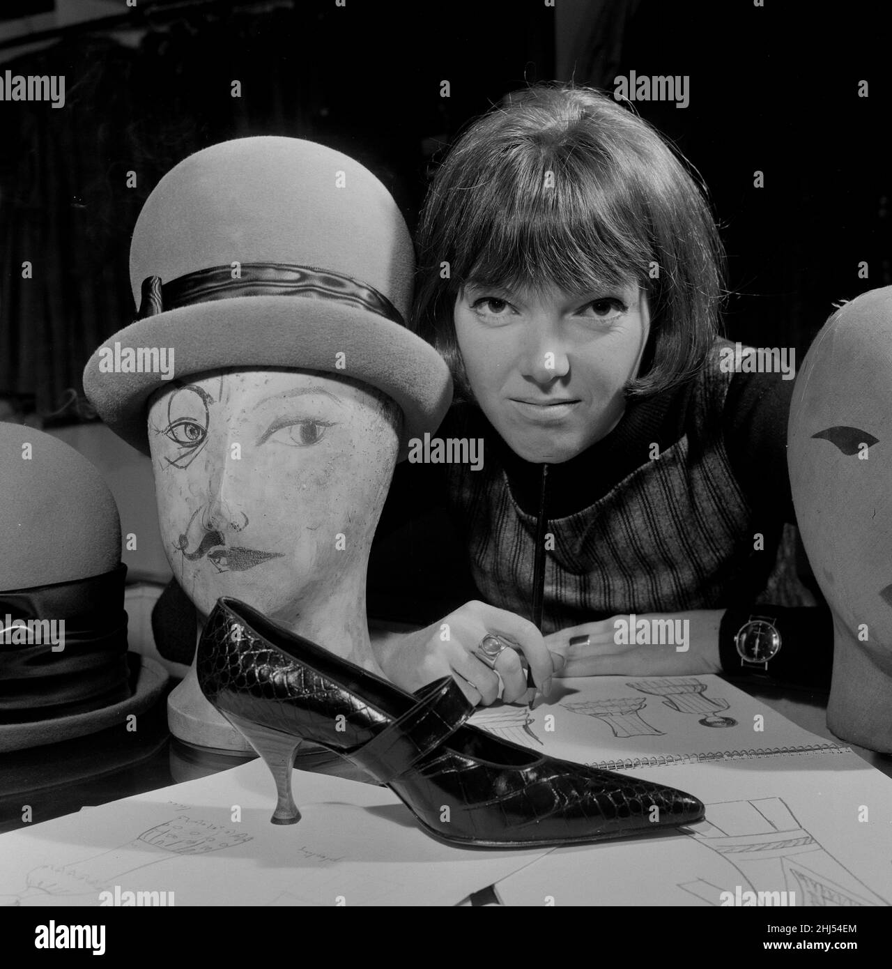 Mary Quant, clothes designer, standing inside her shop Bazaar with ...