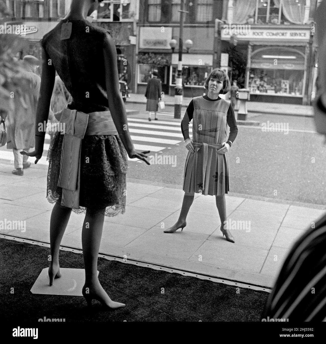 Mary Quant, clothes designer, standing outside her shop Bazaar, and ...