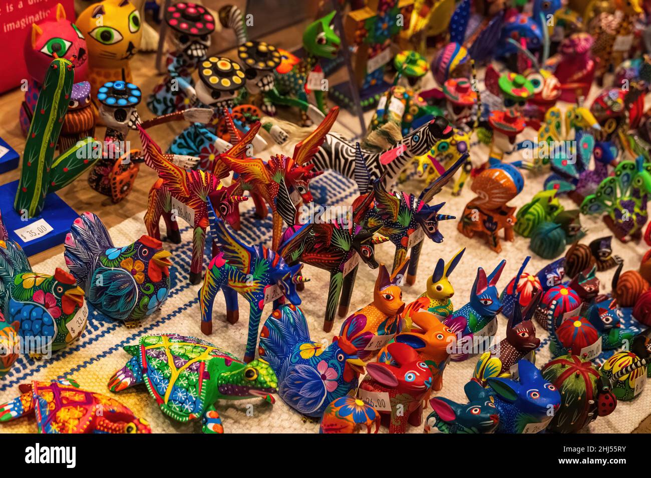 Mexican folk art "Alebrijes," wood carved animal figurines, for sale at ...