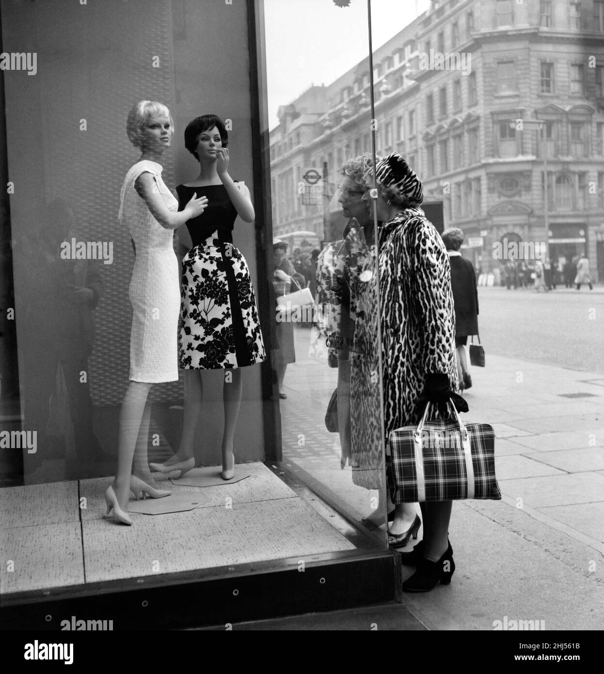 Who's the dummy? Window shopping in Oxford Street, London. Circa 1960 ...