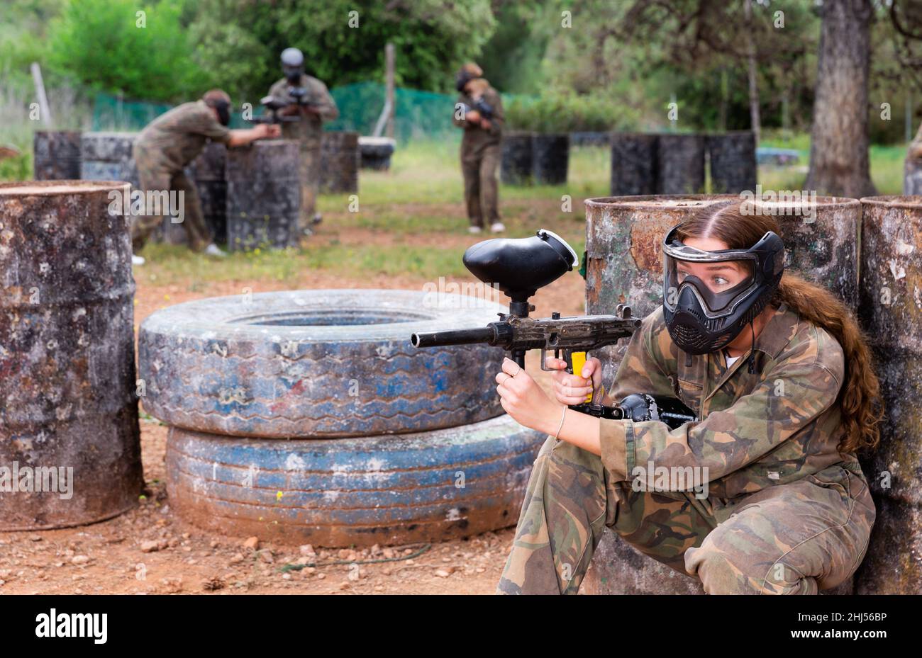 Portrait girl paintball shooting hi-res stock photography and images ...